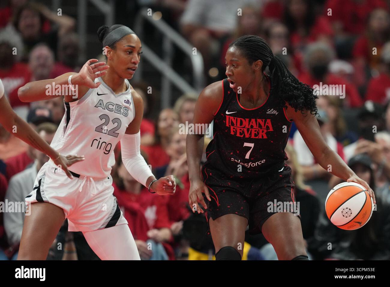 Indiana Fever's Aliyah Boston (7) is defended by Las Vegas Aces' A'ja ...