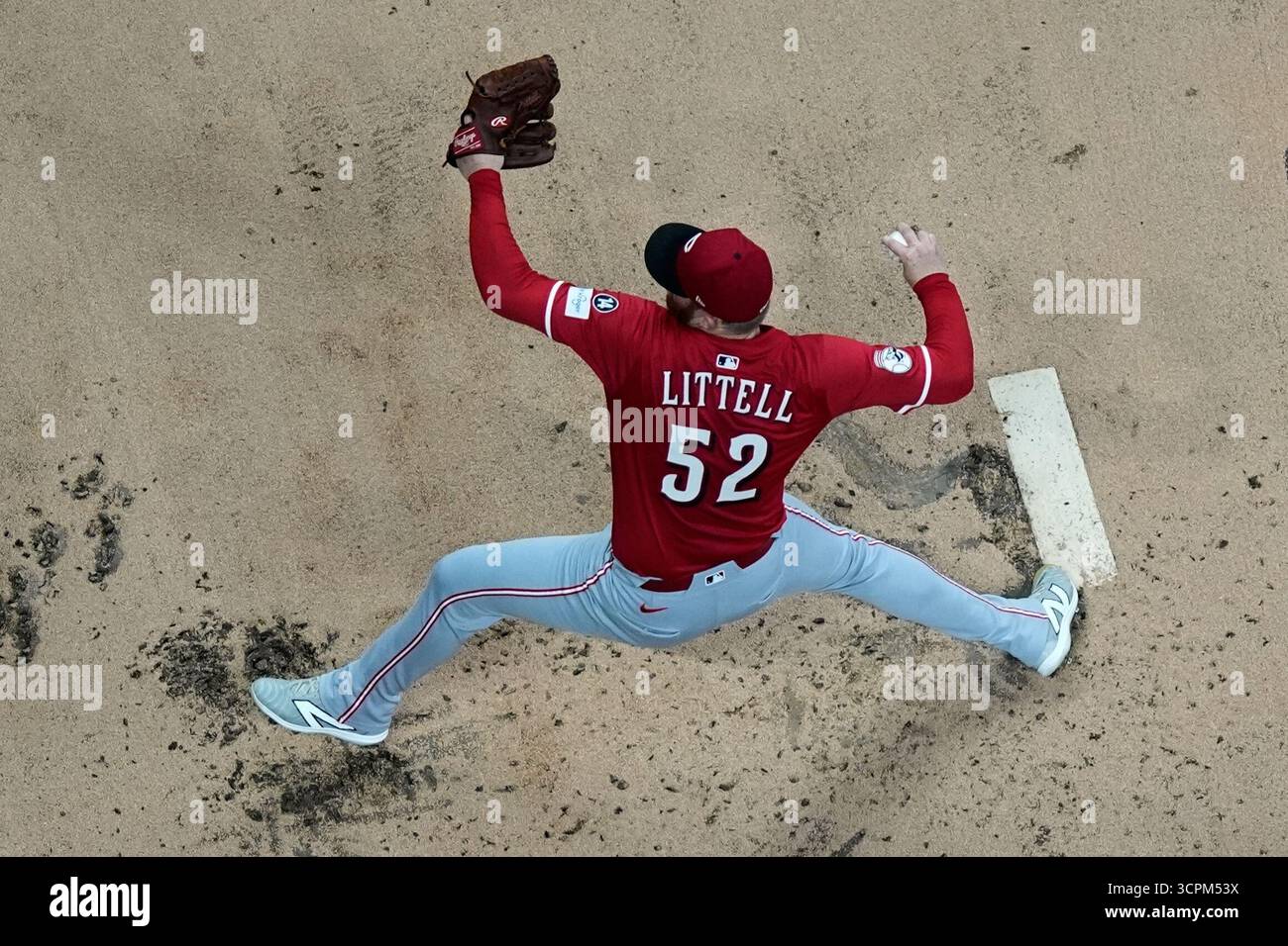 Cincinnati Reds' Zack Littell throws during the first inning of a ...