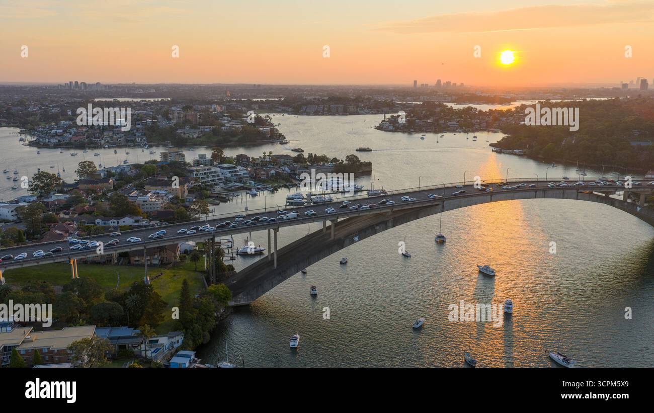 Sunset over the Parramatta river and Gladesville bridge at the Sydney ...