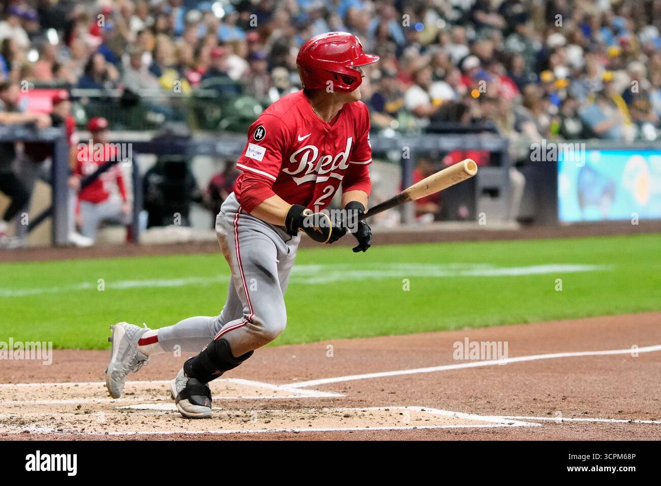 Cincinnati Reds' TJ Friedl hits a double during the third inning of a ...