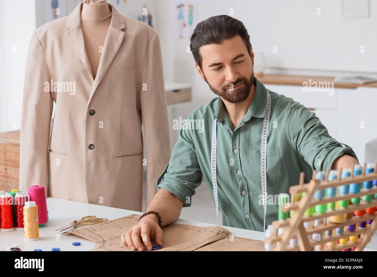 Male tailor working table hi-res stock photography and images - Alamy