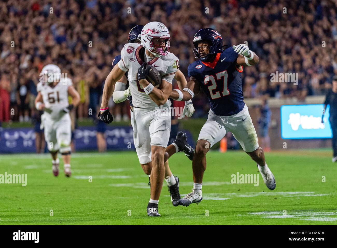 Florida State wide receiver Duce Robinson (0) receives the ball runs ...
