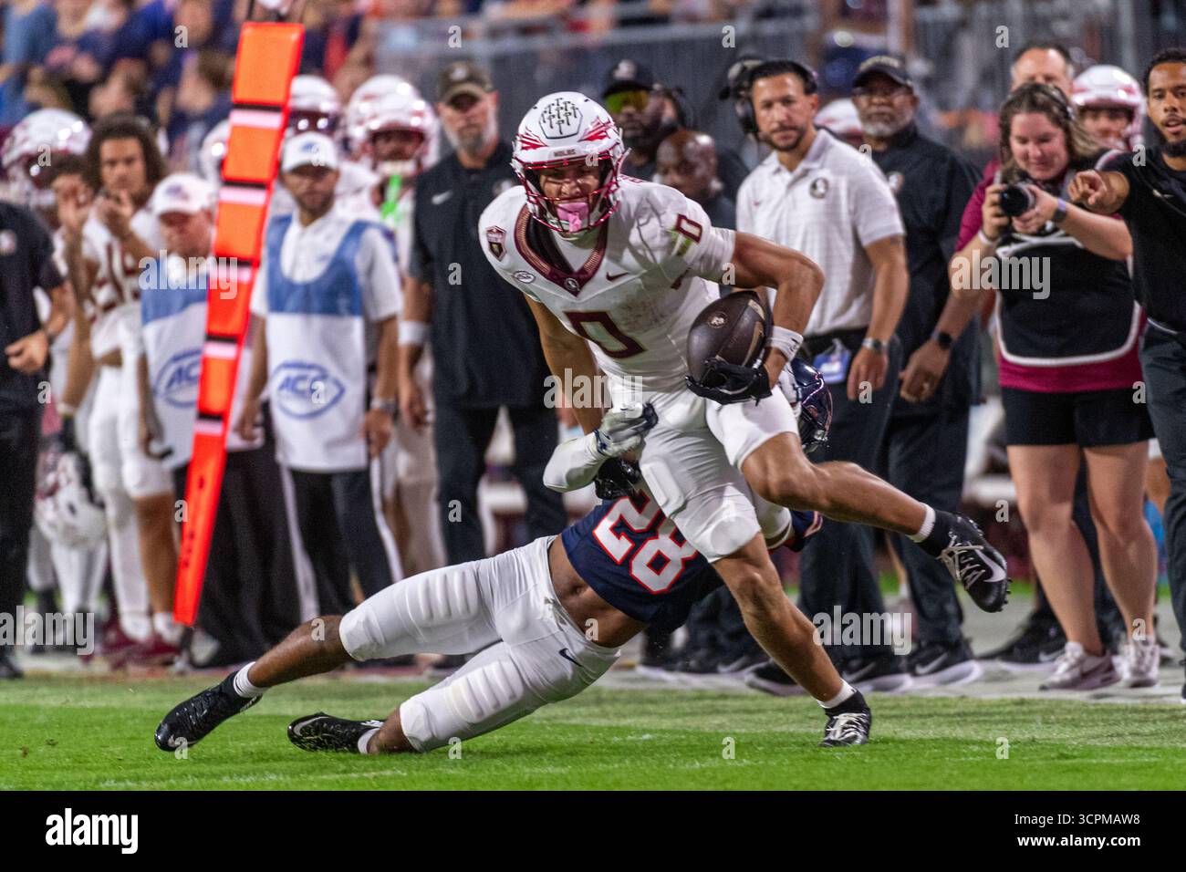 Florida State wide receiver Duce Robinson (0) receives the ball runs ...