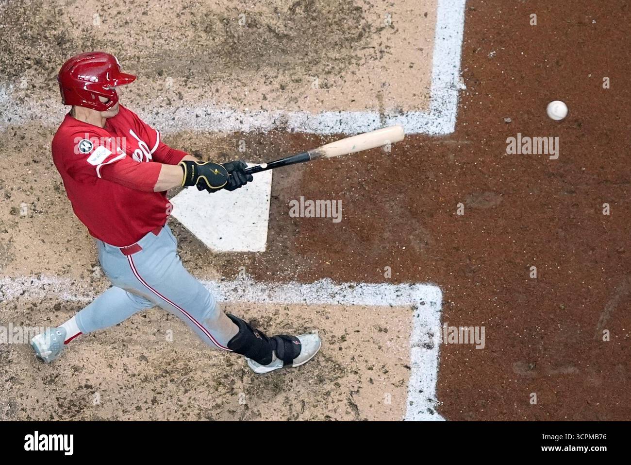 Cincinnati Reds' TJ Friedl hits a single during the fifth inning of a ...