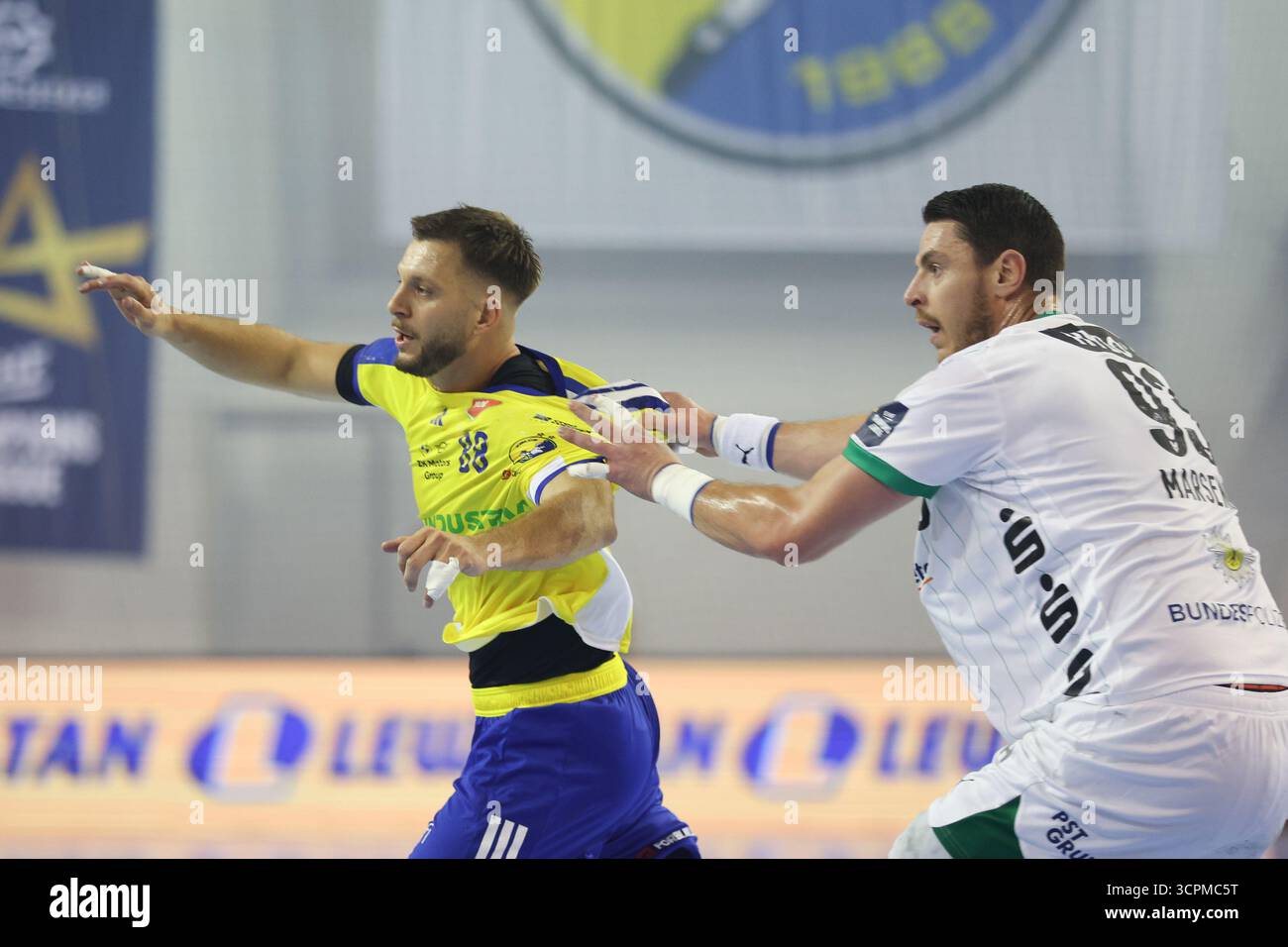 Kielce, Poland. 25th Sep, 2025. Aleks Vlah of Industria Kielece (L) and ...