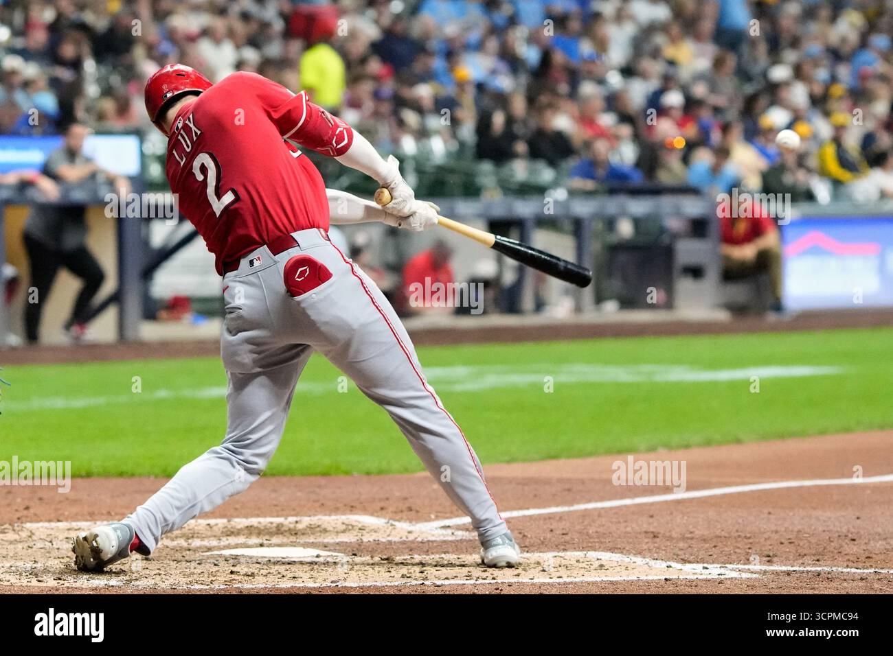 Cincinnati Reds' Gavin Lux hits a double during the sixth inning of a ...