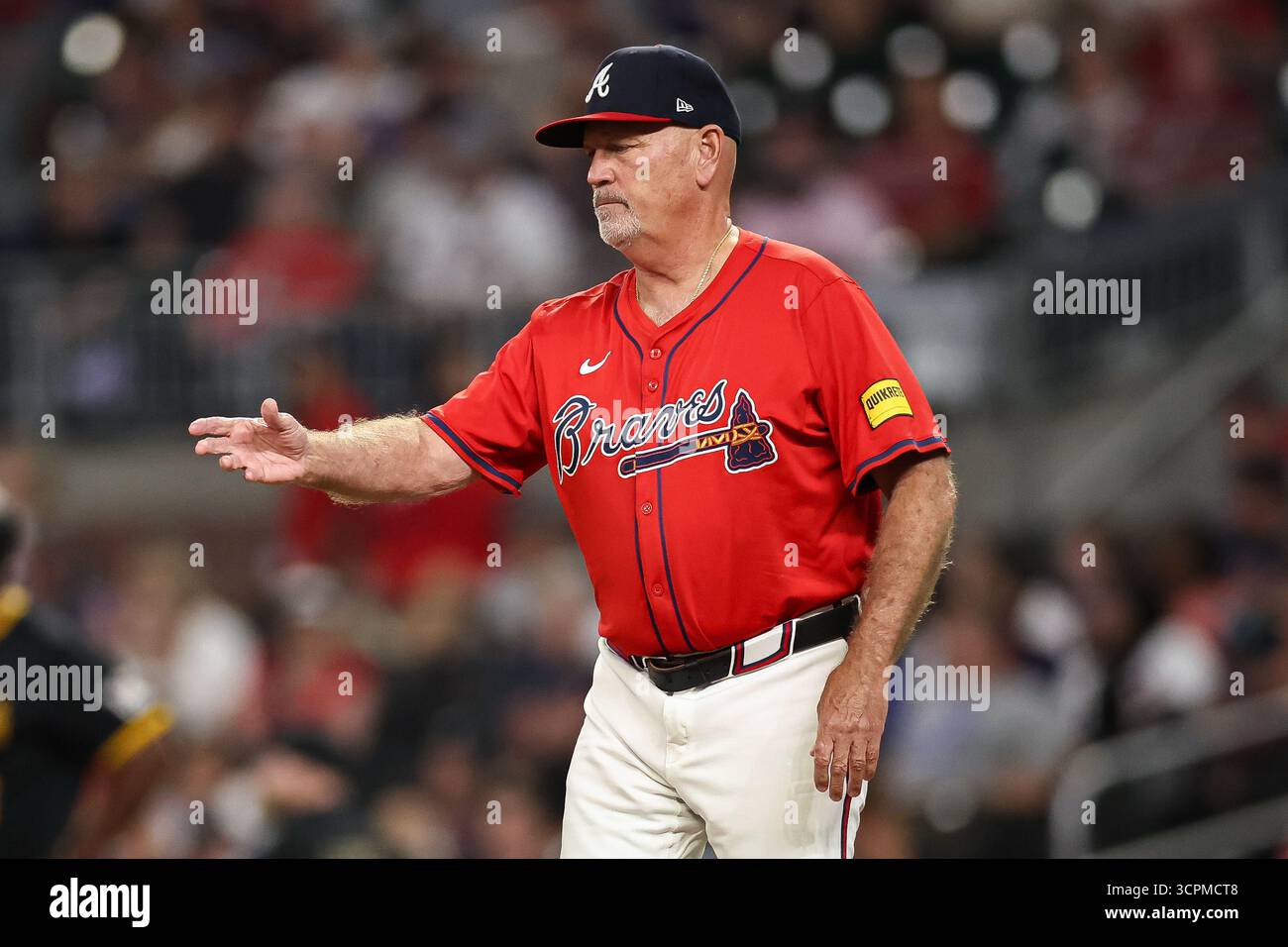 Atlanta Braves manager Brian Snitker walks to the mound to make a pitching change in the fifth ...