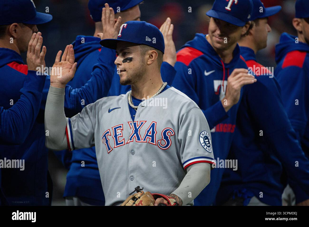 Texas Rangers' Cody Freeman greets his teammates after a baseball game ...
