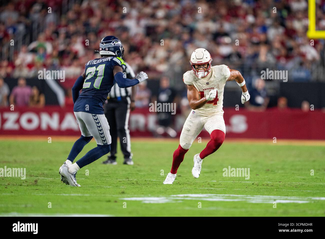 Arizona Cardinals wide receiver Michael Wilson (14) runs toward Seattle ...