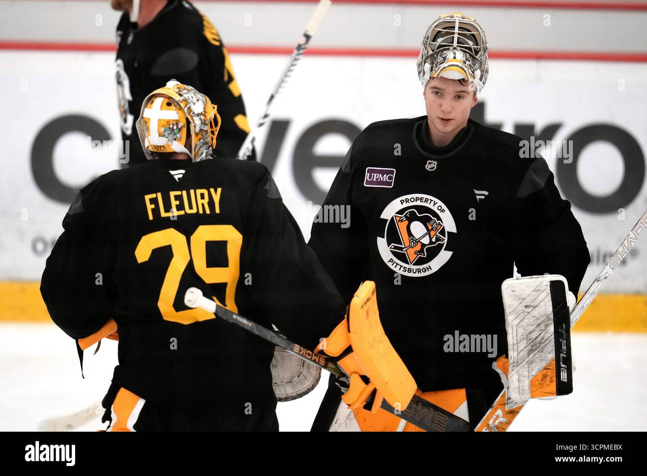 Pittsburgh Penguins goalie Marc-Andre Fleury (29) trades places with ...