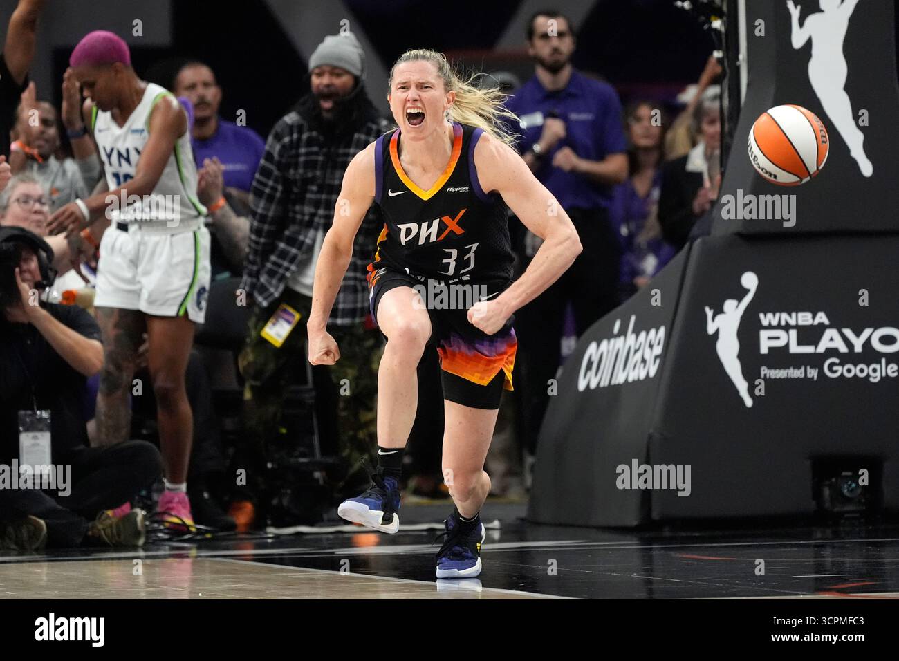 Phoenix Mercury guard Sami Whitcomb (33) celebrates her score against ...