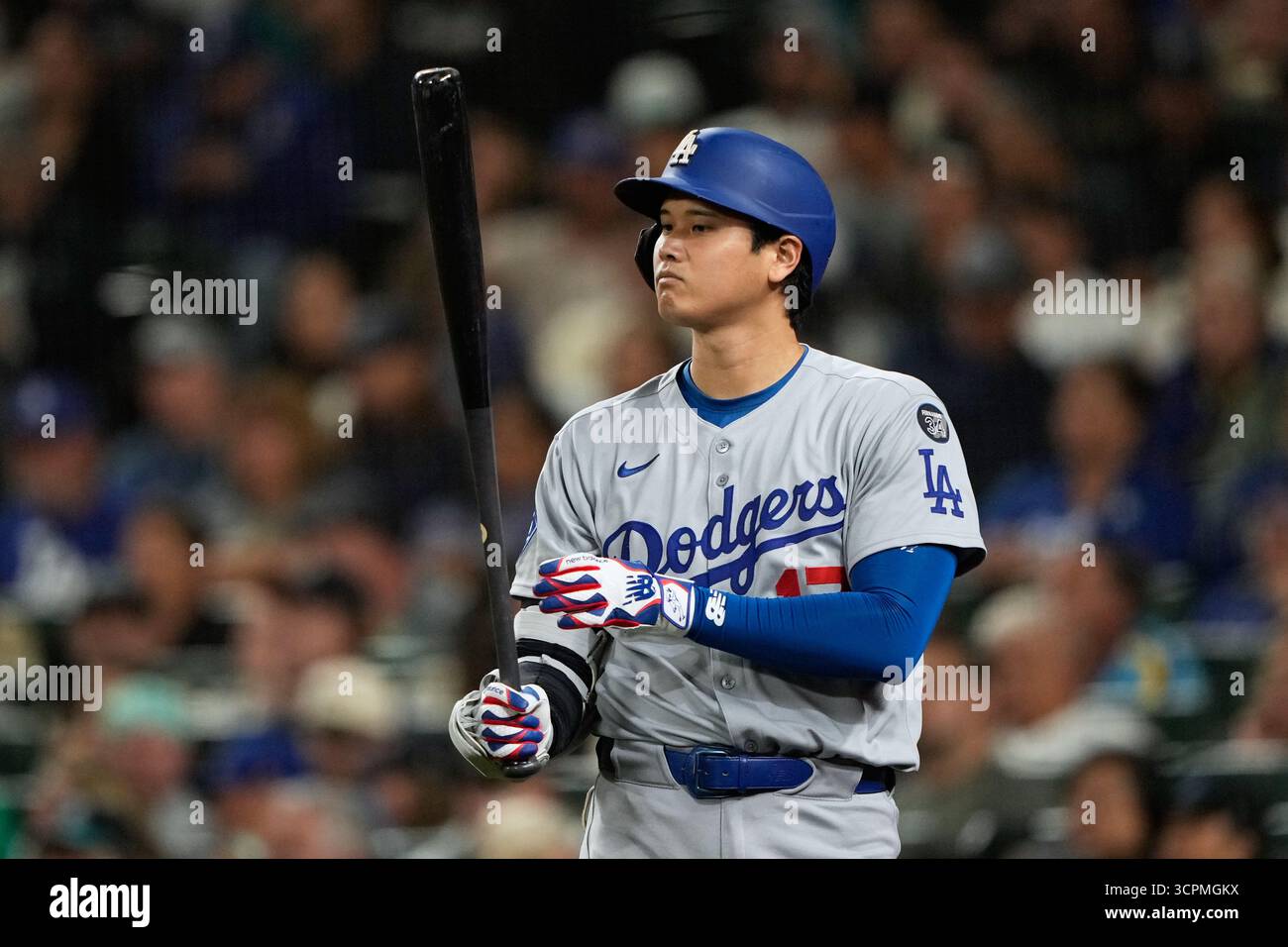 Los Angeles Dodgers designated hitter Shohei Ohtani stands in the ...