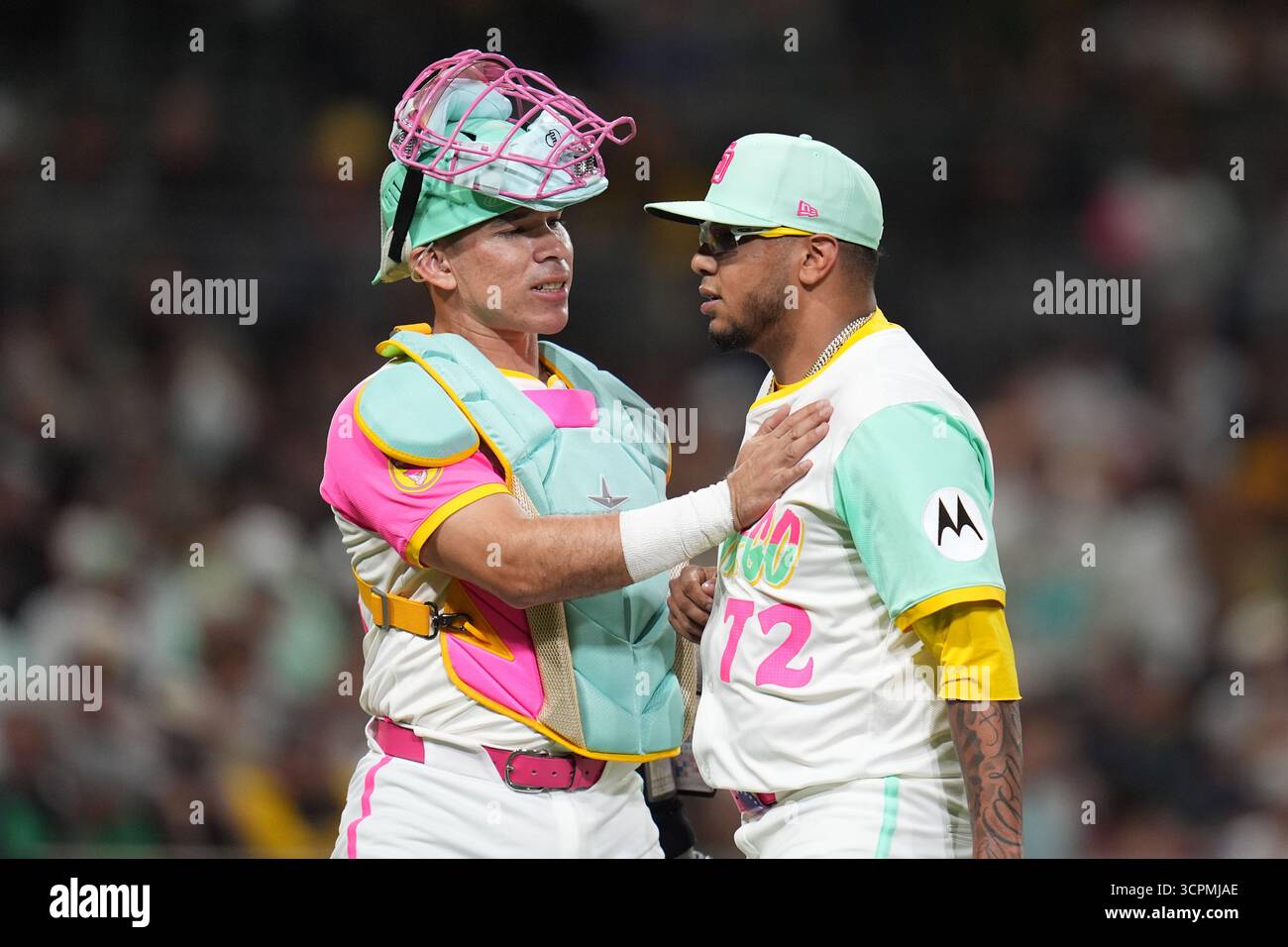 San Diego Padres catcher Freddy Fermin, left, celebrates with starting ...