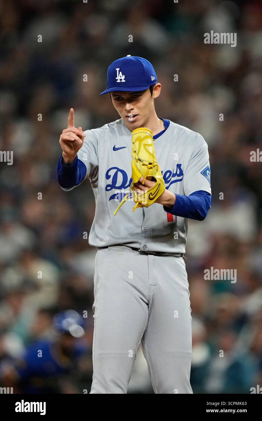 Los Angeles Dodgers relief pitcher Roki Sasaki gestures on the mound ...