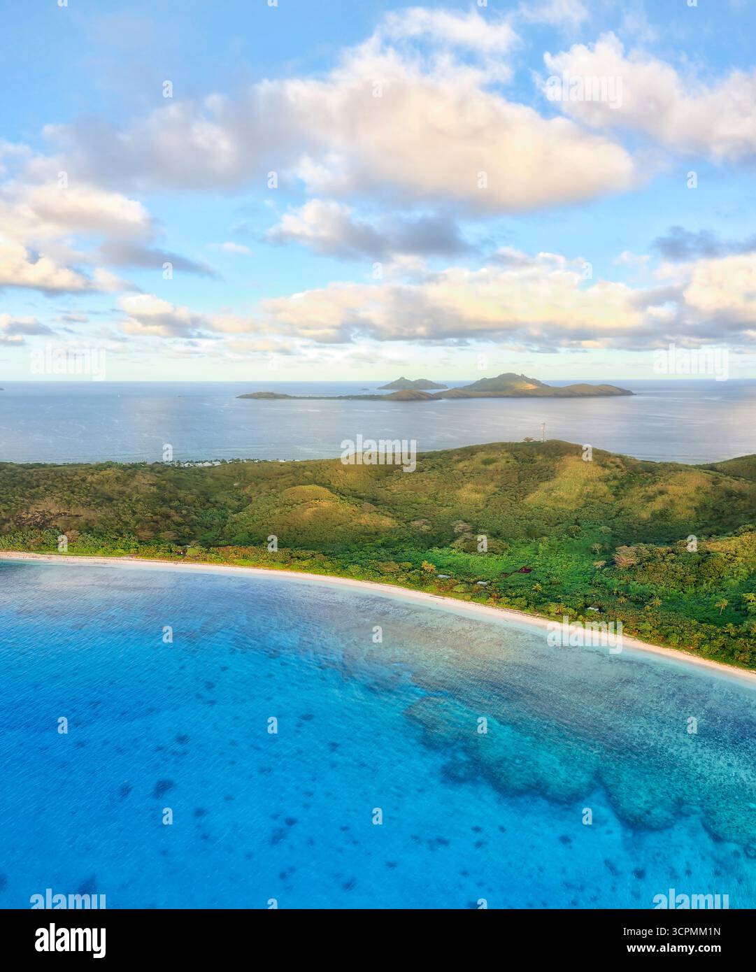 Top down view over blue clear Pacific ocean waters of coral reef ...
