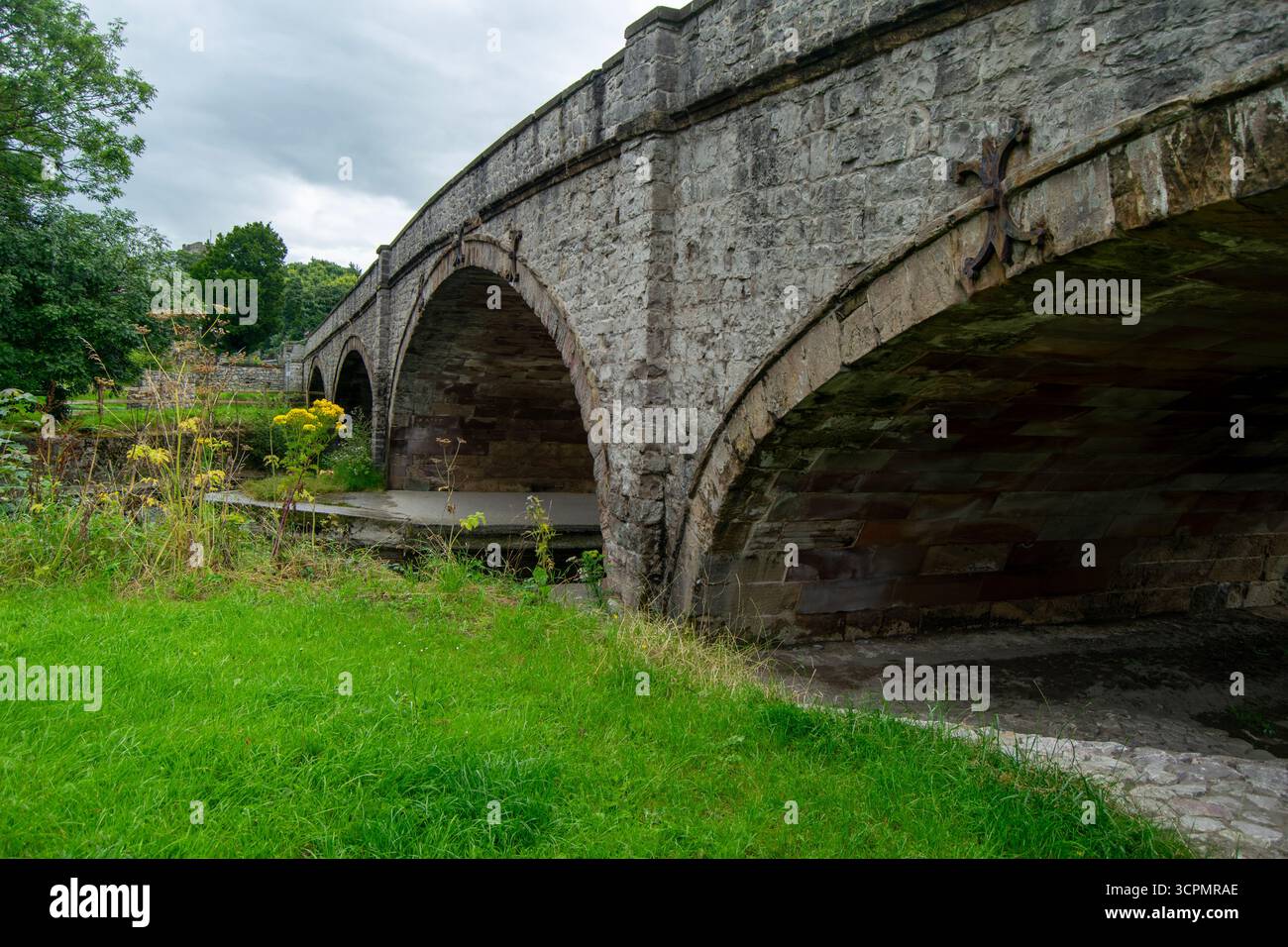 Historic Elwy Bridge stone arch crossing over the River Elwy in St ...