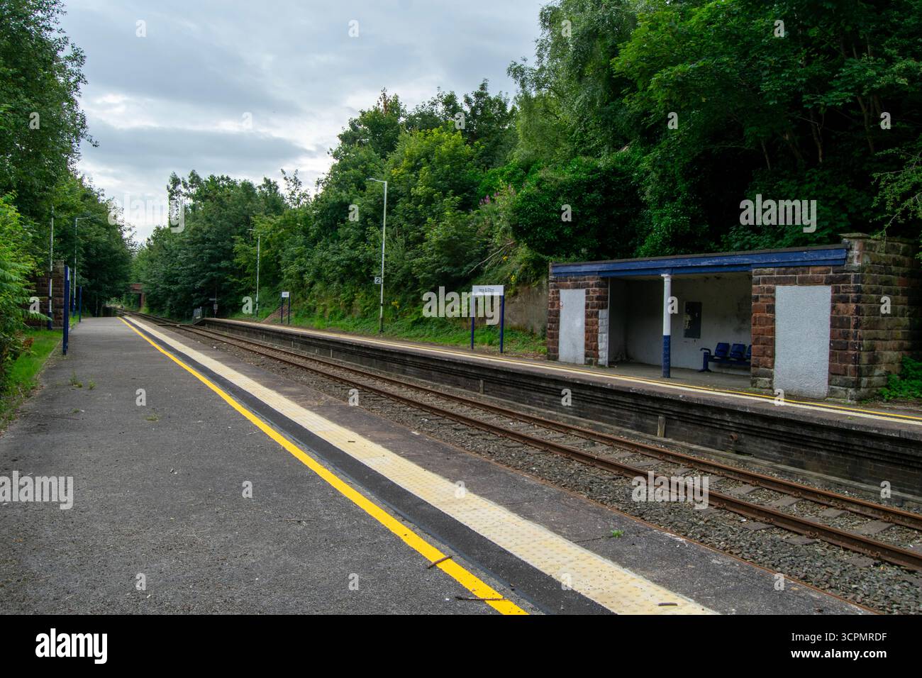 Tranquil view of Ince and Elton Railway Station, Cheshire, featuring ...