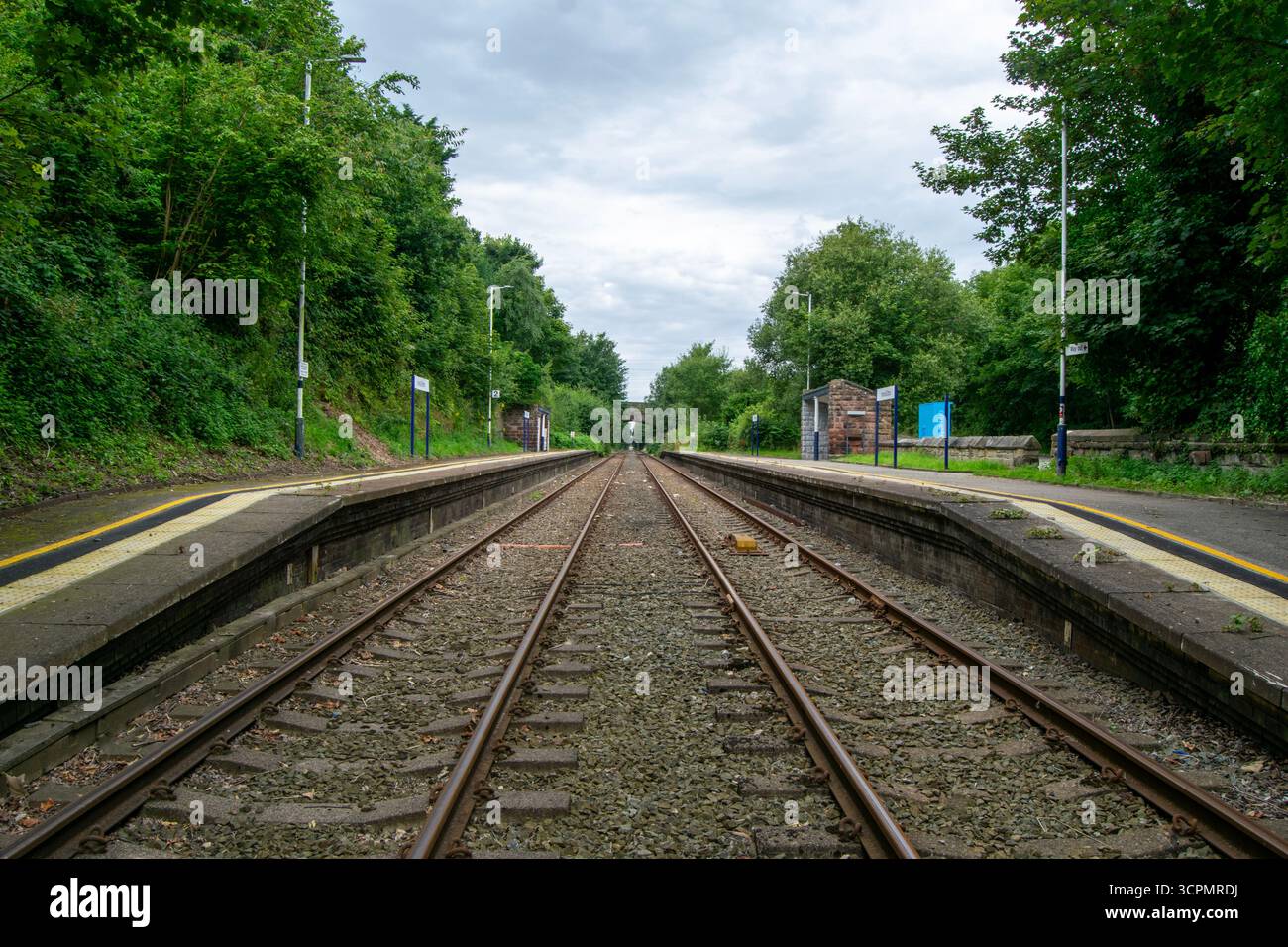 Tranquil view of Ince and Elton Railway Station, Cheshire, featuring ...