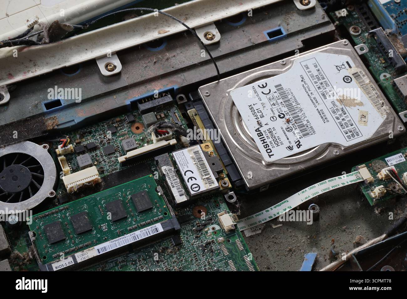 Teardown of old notebook laptop. Laptop component such as hard disk ...