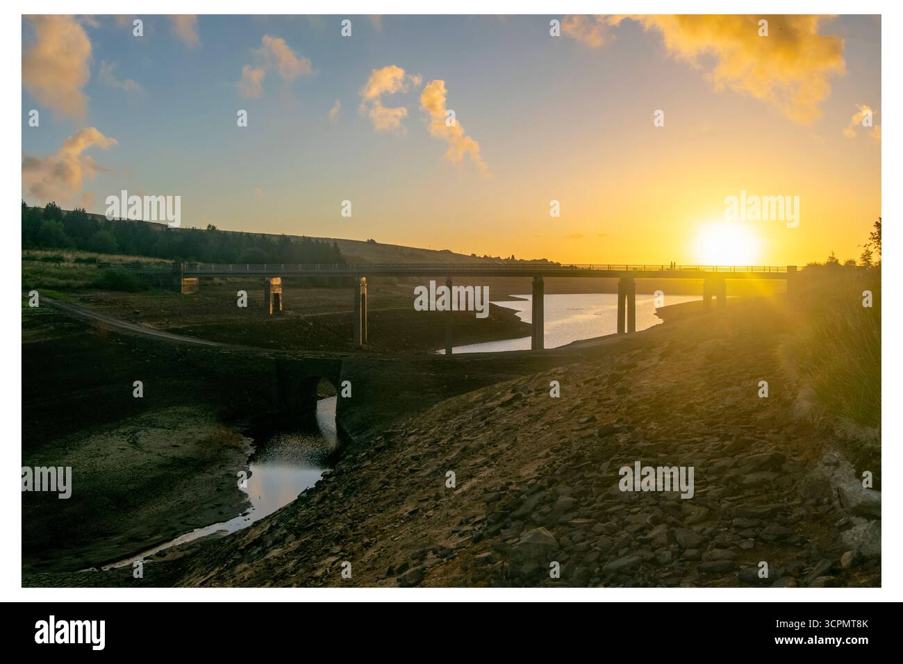 Sunrise at Baitings Reservoir, showcasing the extreme low water levels ...