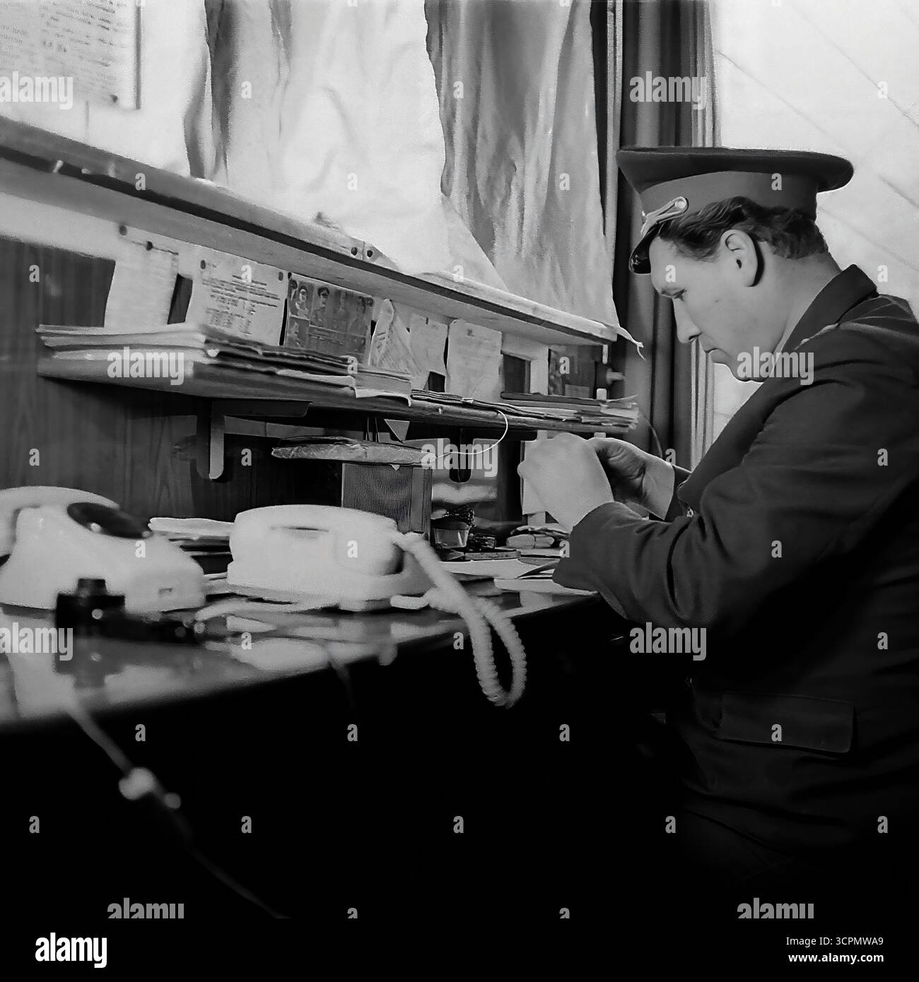 A Soviet GAI (State Automobile Inspectorate) officer is captured in a ...