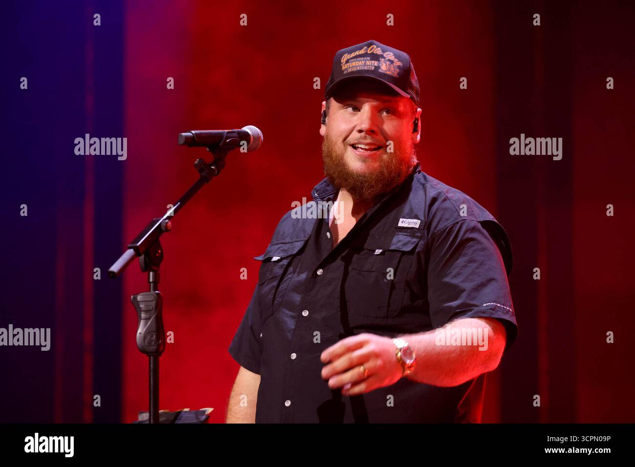 EDITORIAL USE ONLY Luke Combs performs during Grand Ole Opry: Live in ...