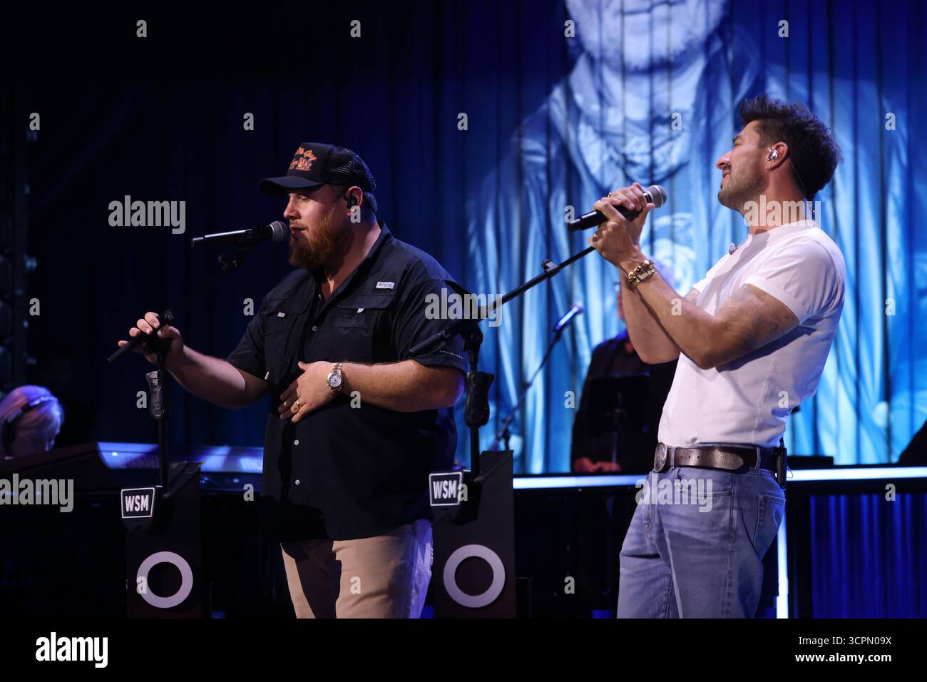 EDITORIAL USE ONLY Luke Combs and Marcus Mumford perform during Grand ...