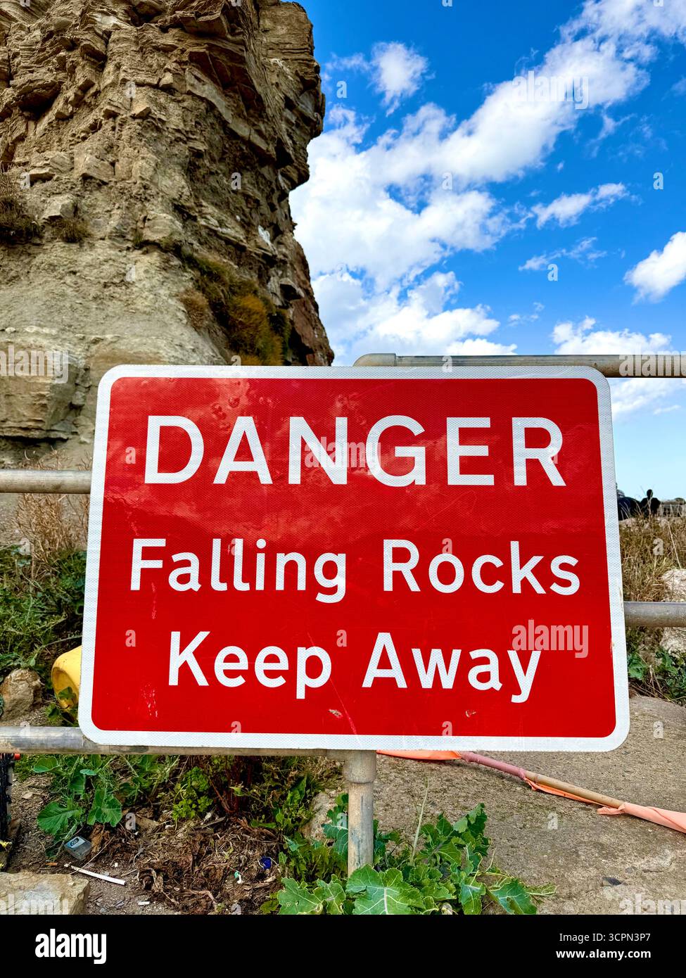 Danger of falling rocks warning sign on the North Yorkshire Coast ...
