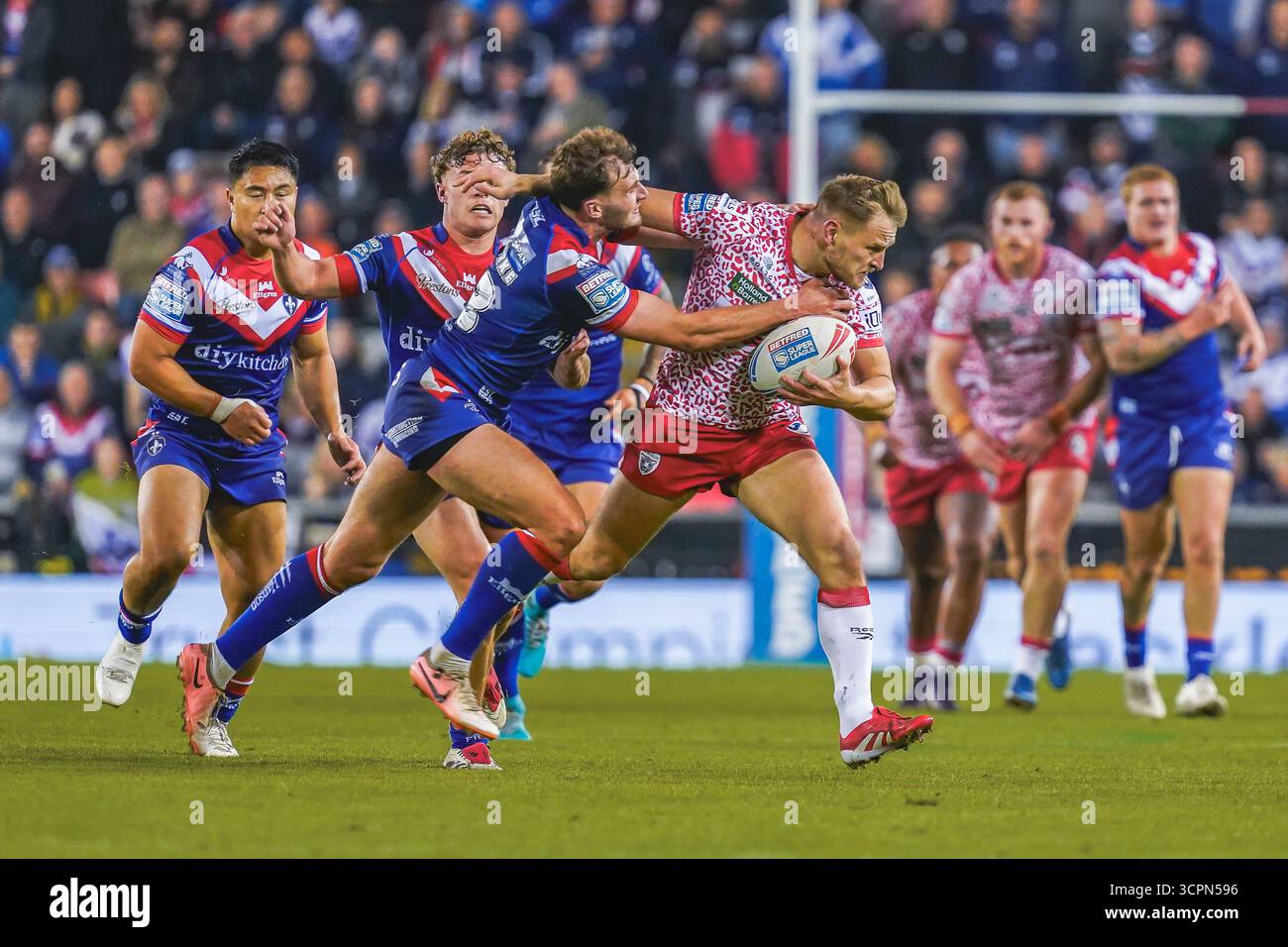 LEIGH, ENGLAND - September 26: Brad Dwyer of Leigh Leopards hands off ...
