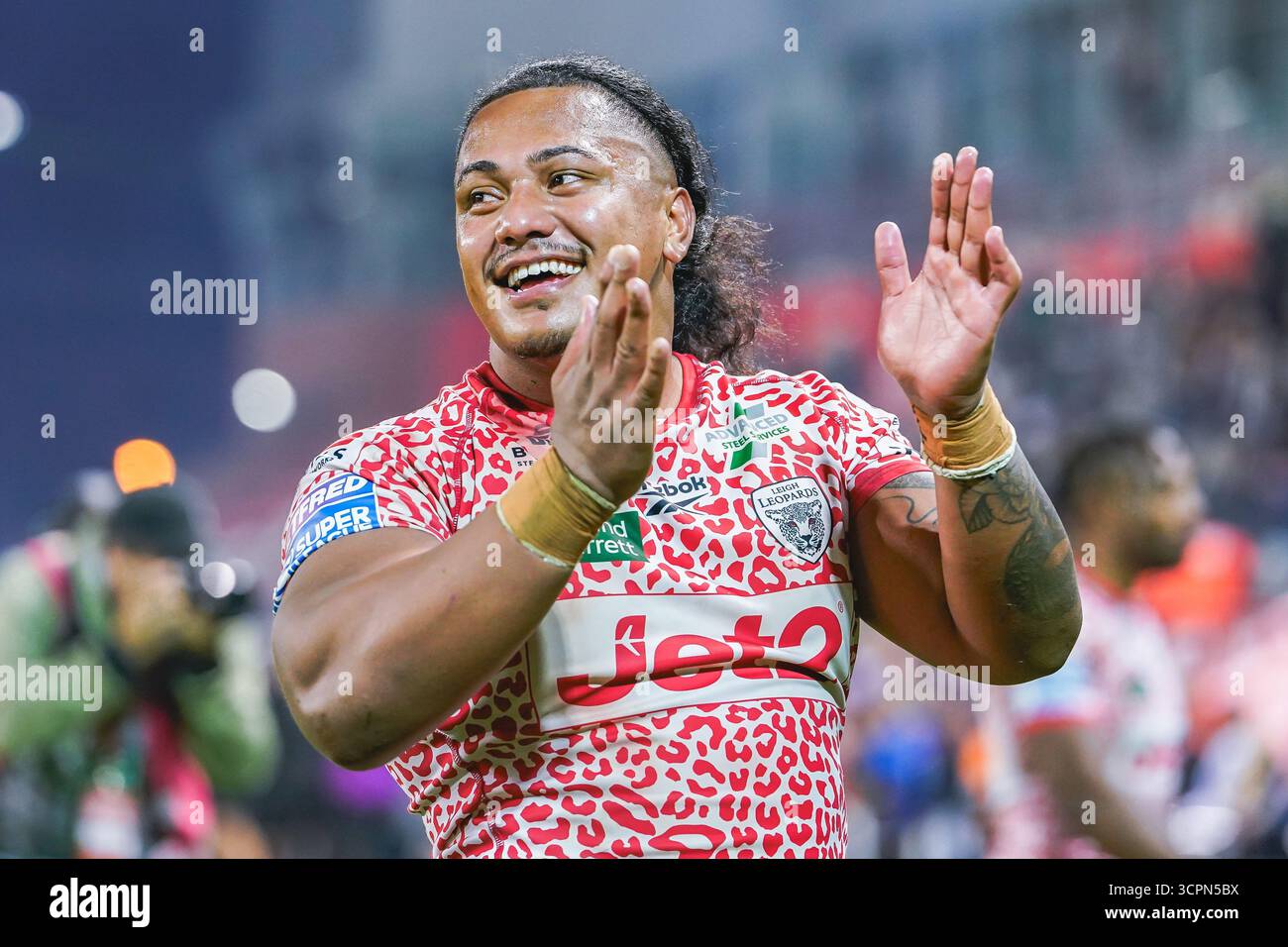LEIGH, ENGLAND - September 26: Tesi Niu of Leigh Leopards claps the ...