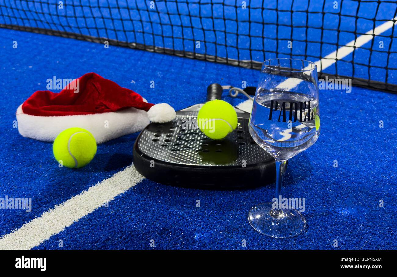 padel racket and santa hat Stock Photo - Alamy
