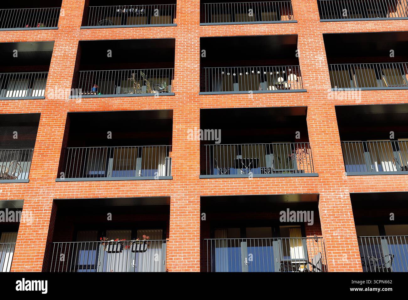 Balconies on the exterior of an apartment tower block in Leeds,West ...