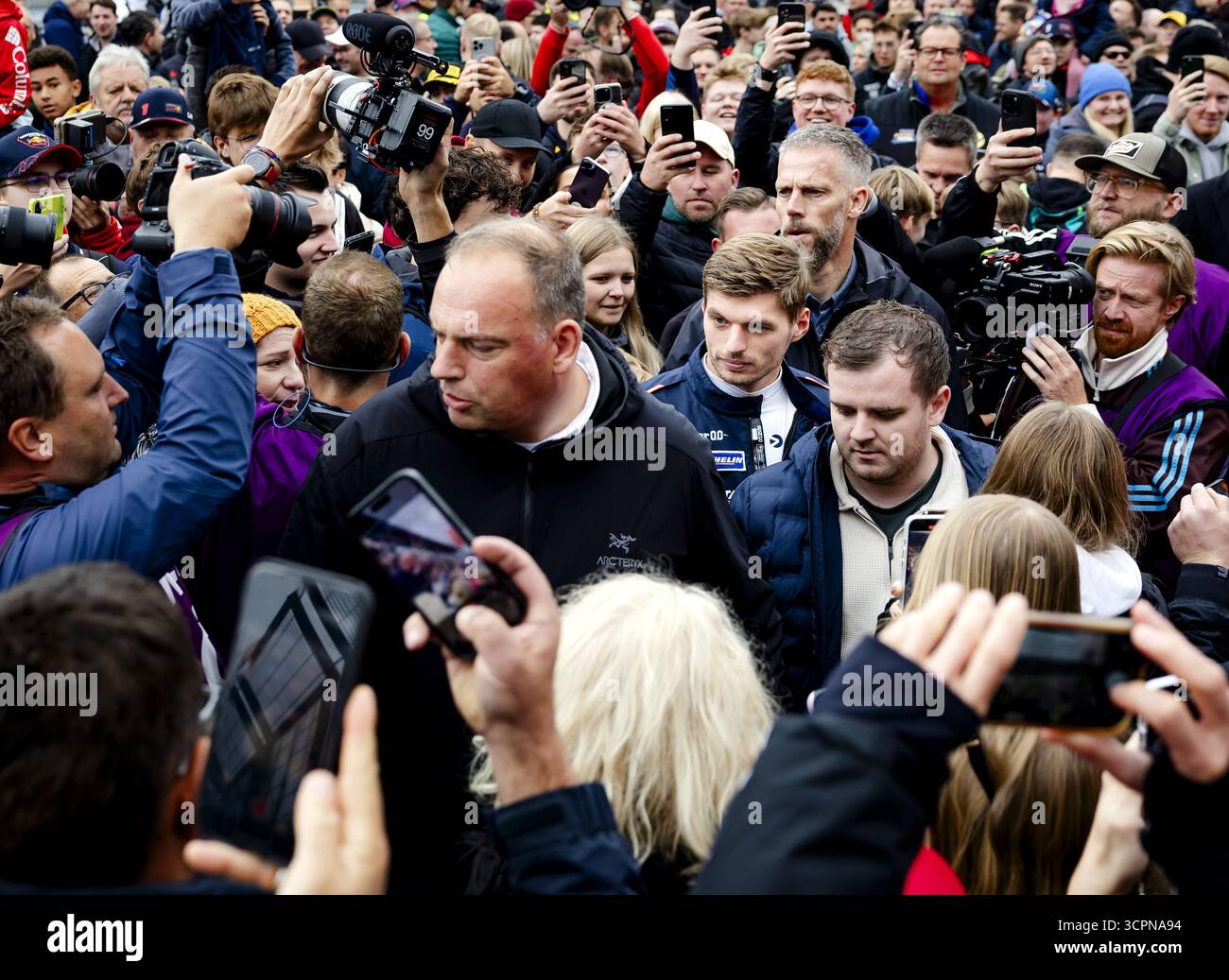 NÜRBURG - Max Verstappen walks to the start of his first race in the ...