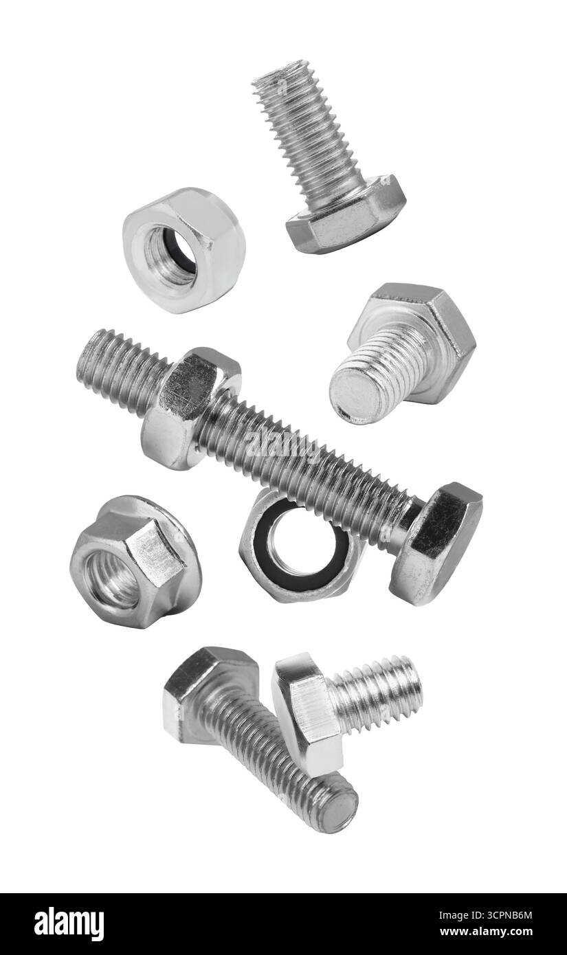 Different bolts and nuts falling against white background Stock Photo ...
