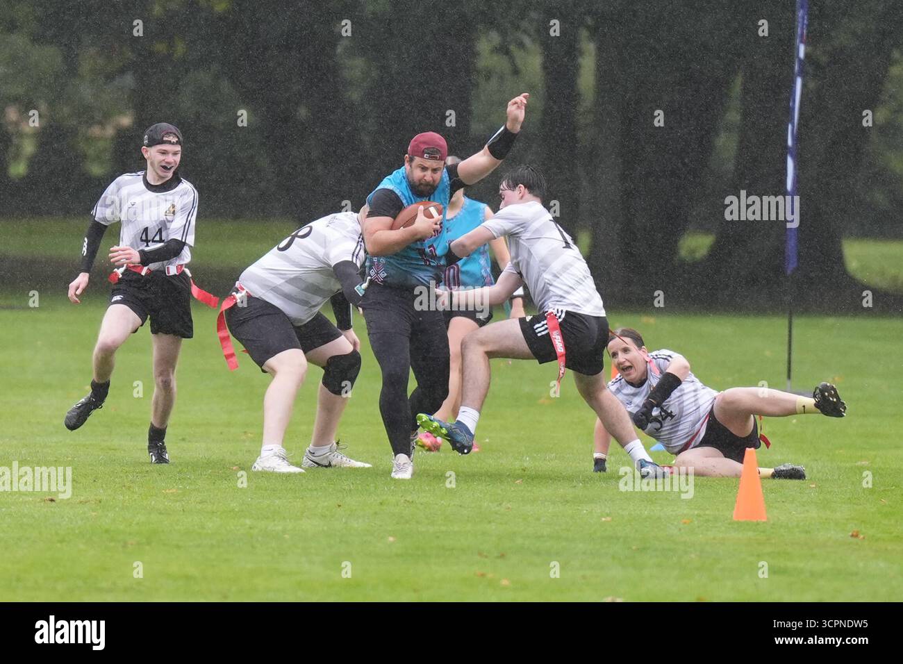 Players take part in an exhibition American Touch football match ahead ...