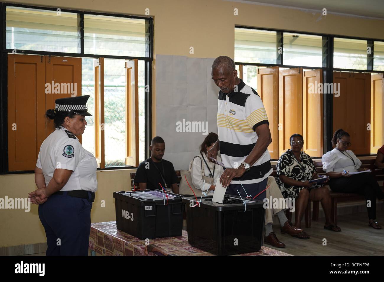 Victoria, Seychelles. 27th Sep, 2025. A voter casts his vote at a ...