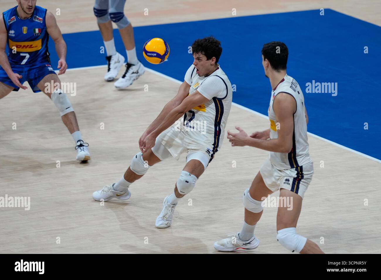 Mattia Bottolo of Italy, center, passes the ball during the semifinal ...