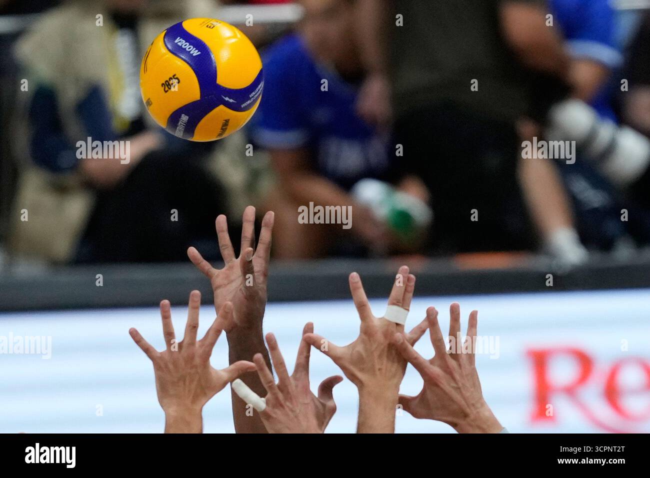 Players form Italy and Poland battle for the ball during their ...