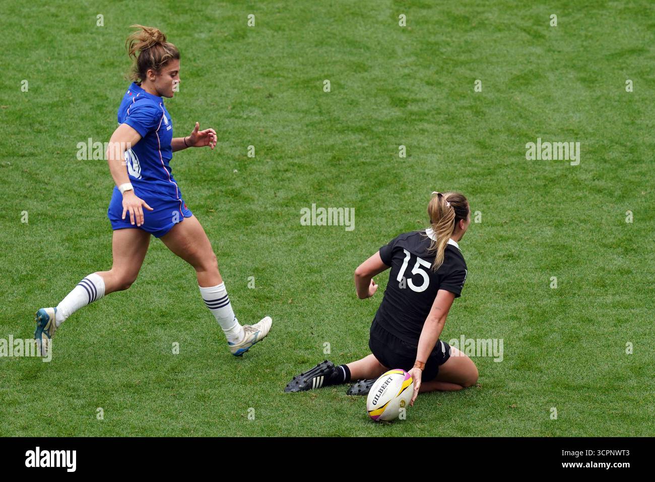 New Zealand's Renee Holmes (right) breaks free on the way to score ...