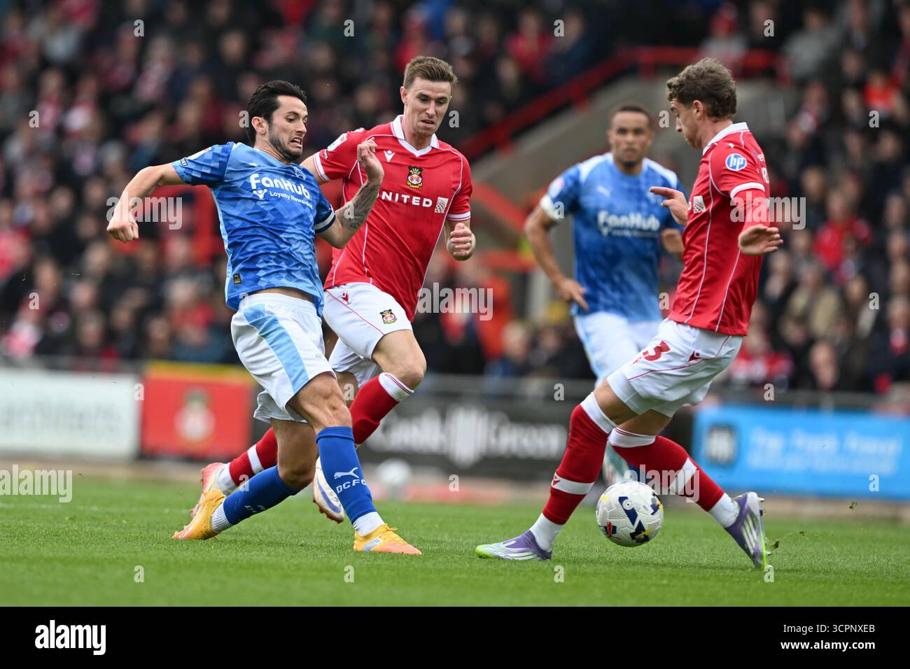 Derby County's Max Johnston (left) and Wrexham's Lewis Brunt (right ...