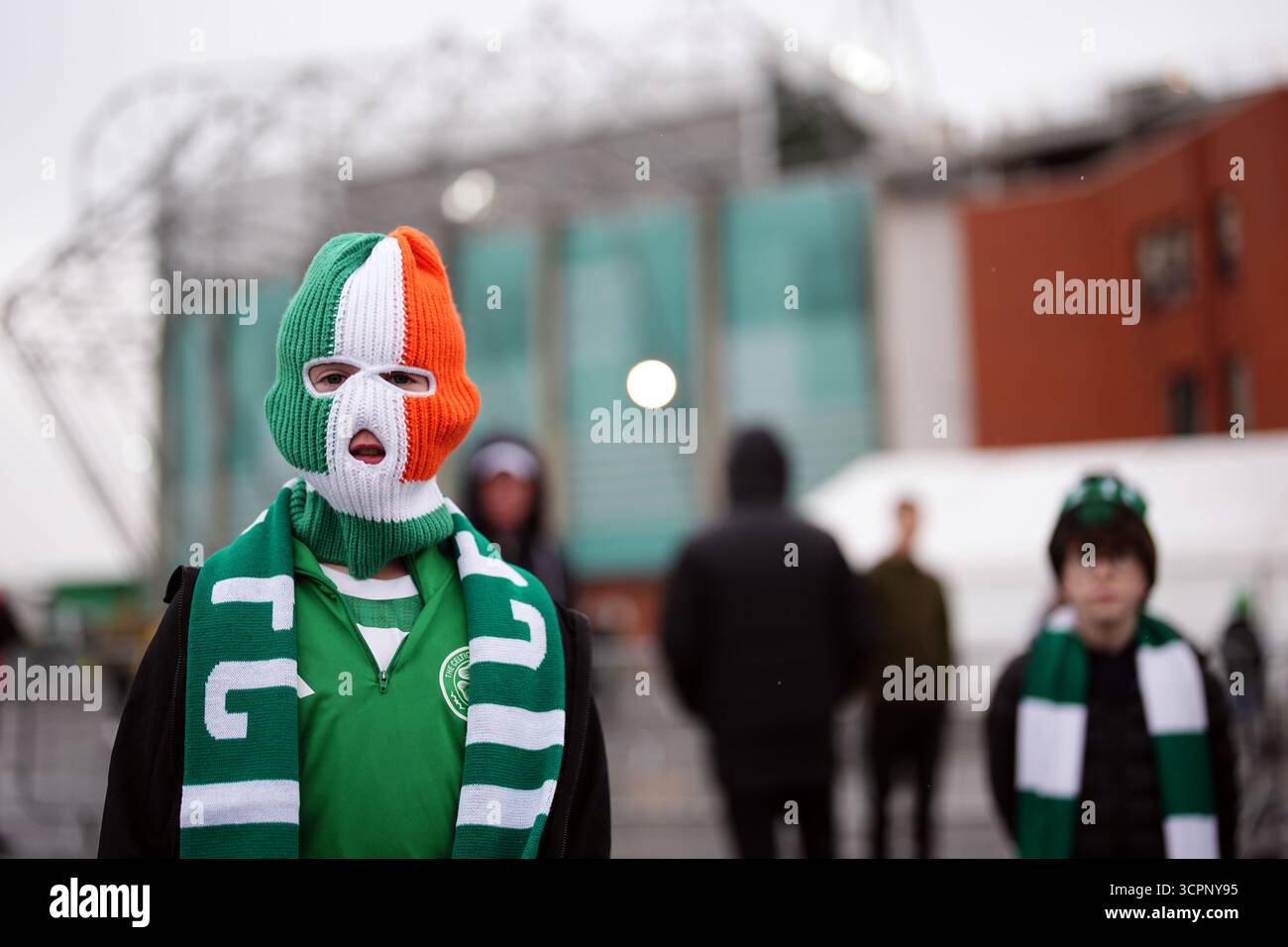 A young Celtic supporter in a balaclava before the William Hill ...