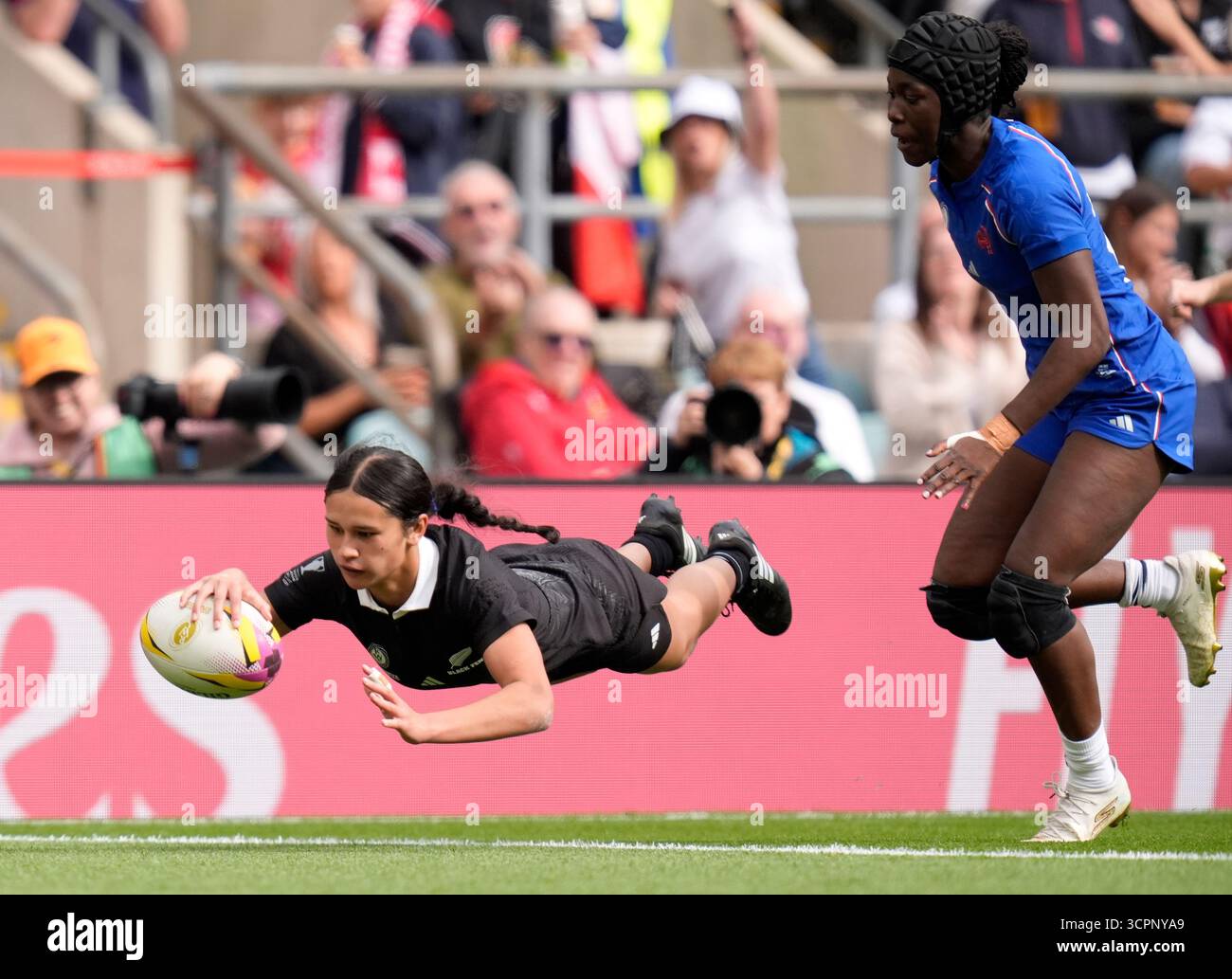 New Zealand's Braxton Sorensen-McGee scores a try during the Women's ...
