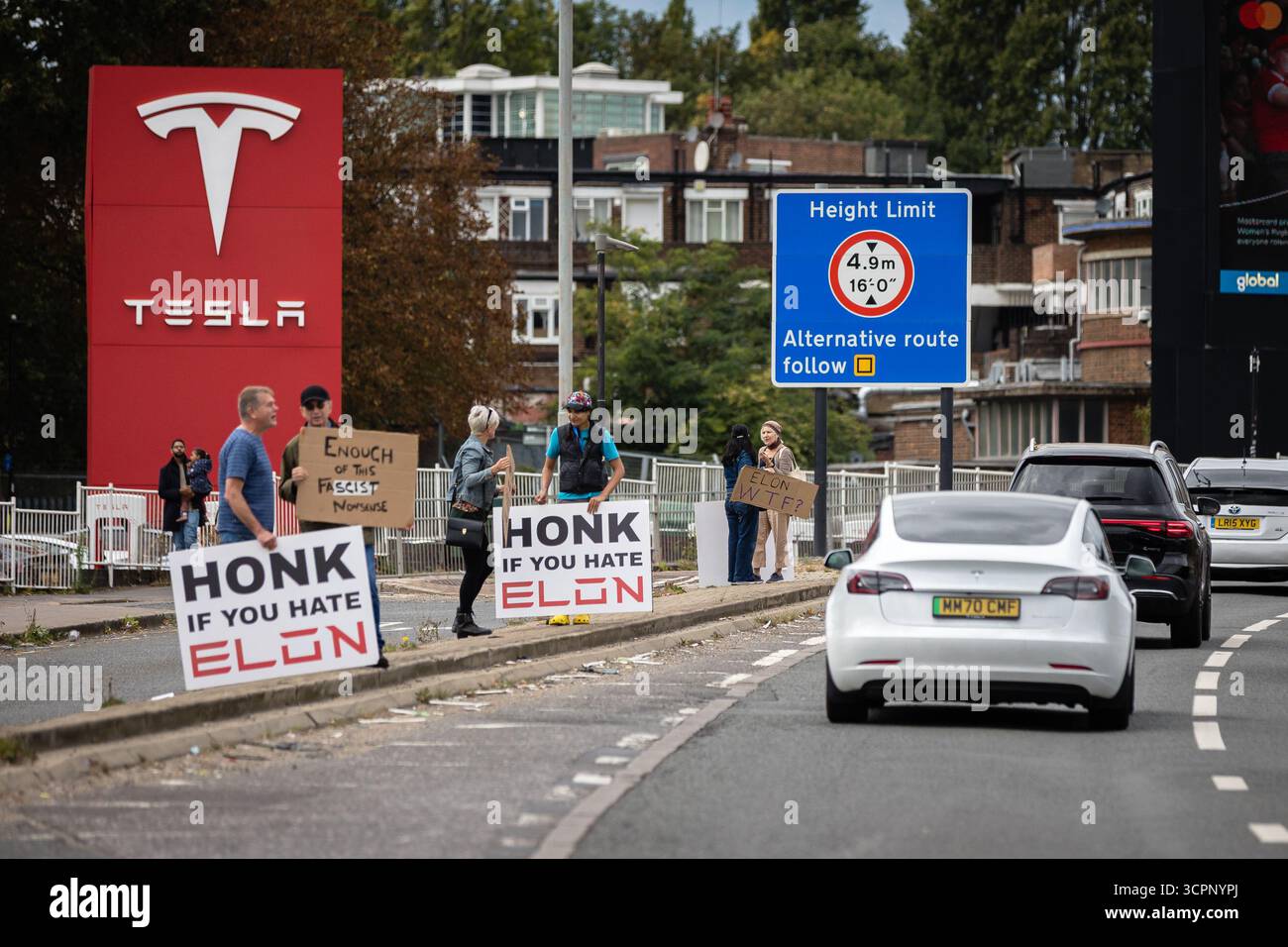 LONDON, UK - 27 Sep 2025: Activists from campaign group Tesla Takedown ...