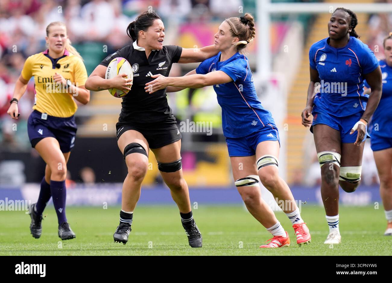 New Zealand's Kaipo Olsen-Baker (left) is tackled by France's Lea ...
