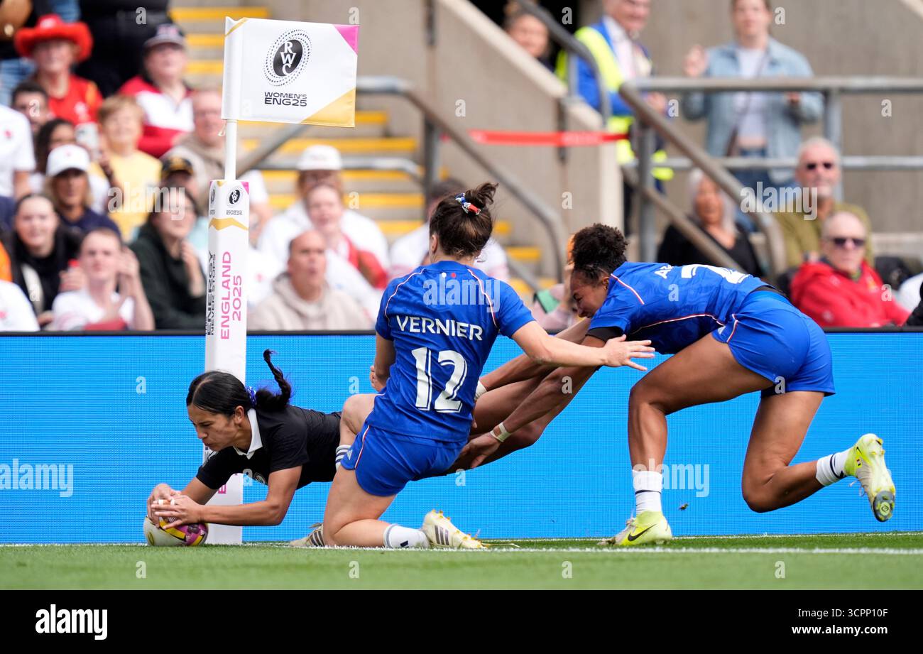 New Zealand's Braxton Sorensen-McGee (left) scores a try during the ...