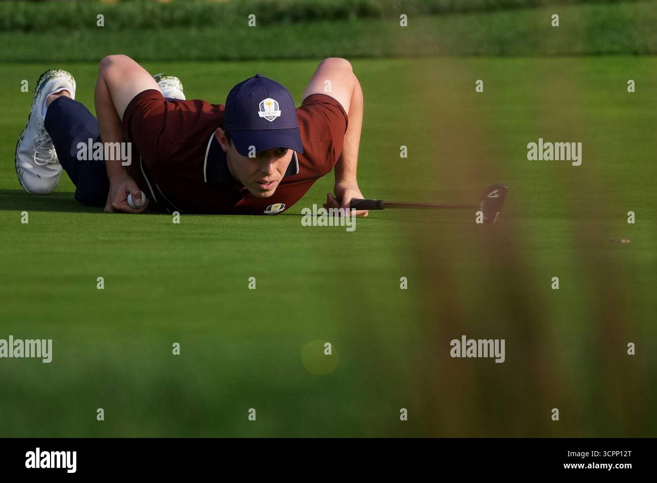 Europe's Matthew Fitzpatrick lines up a putt on the seventh hole at ...