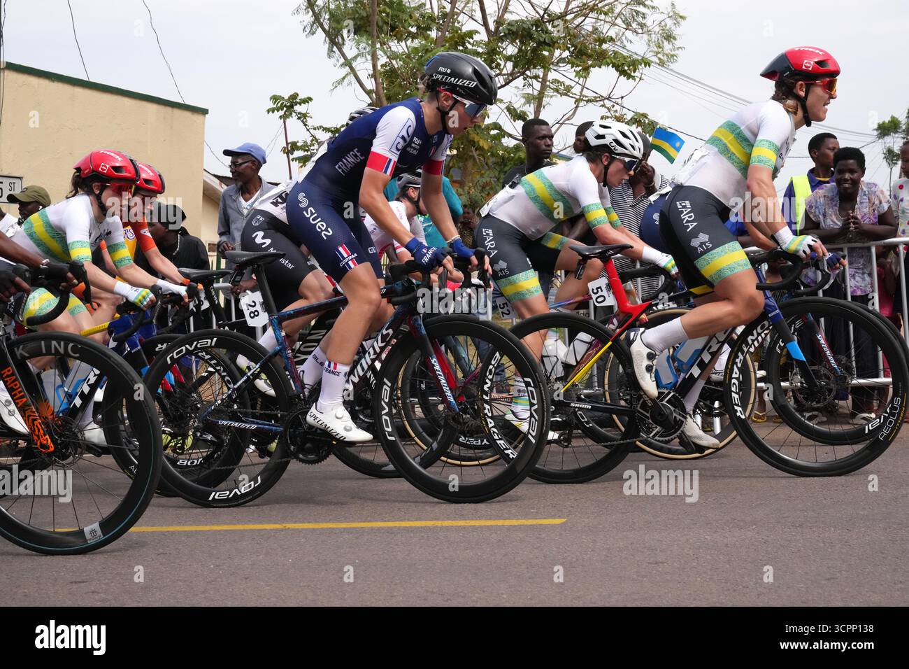 Australia's Lauretta Hanson, right, leads Australia's Ruby Roseman-Gannon and France's Marie Le ...