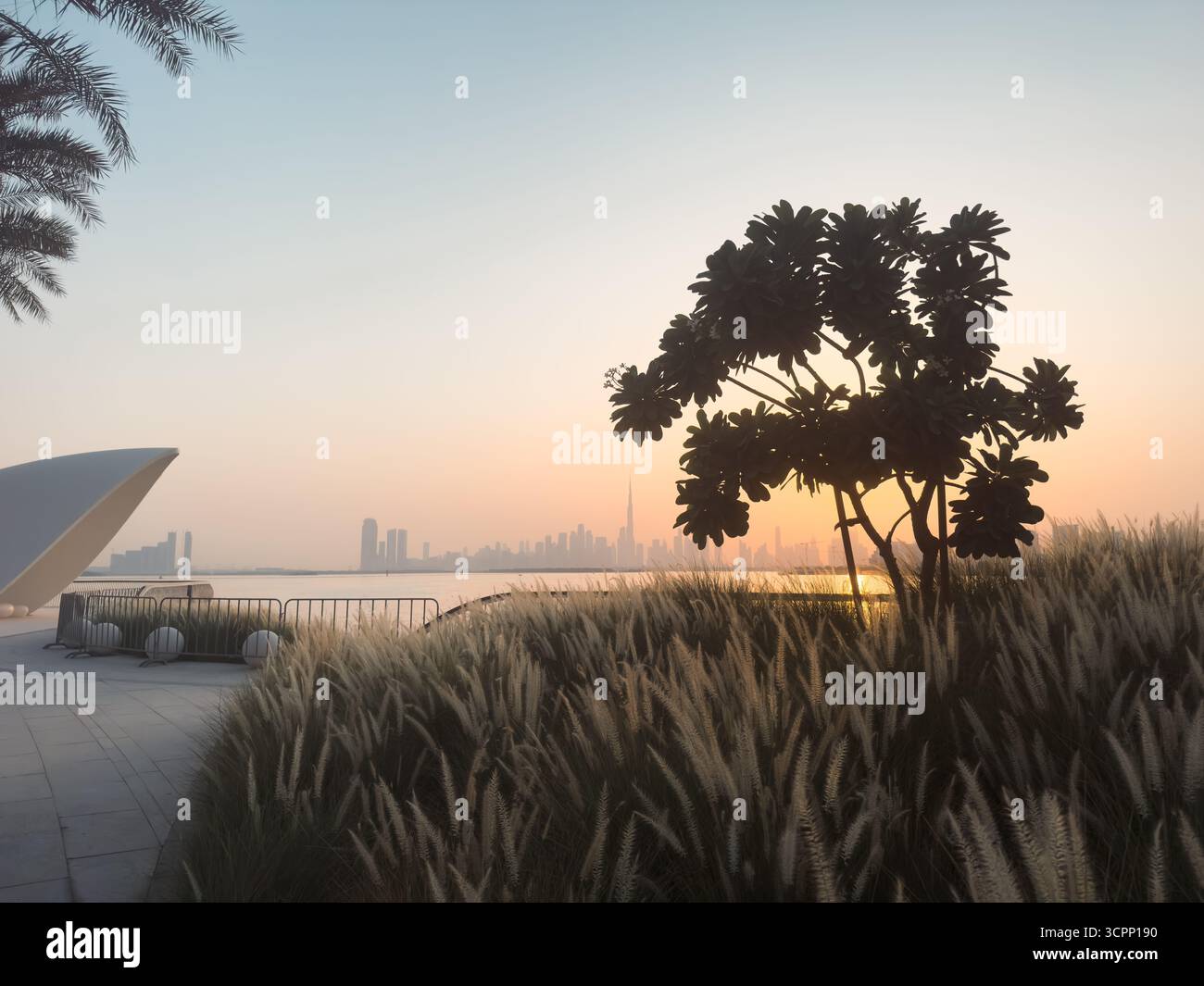 faded Burj khalifa skyline silhouette at golden hour in Dubai with ...