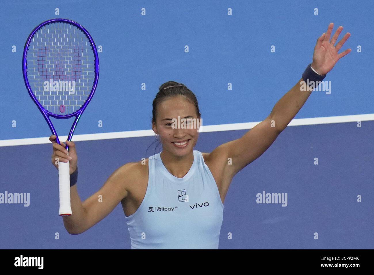 Zheng Qinwen, of China celebrates after defeating Emiliana Arango, of ...