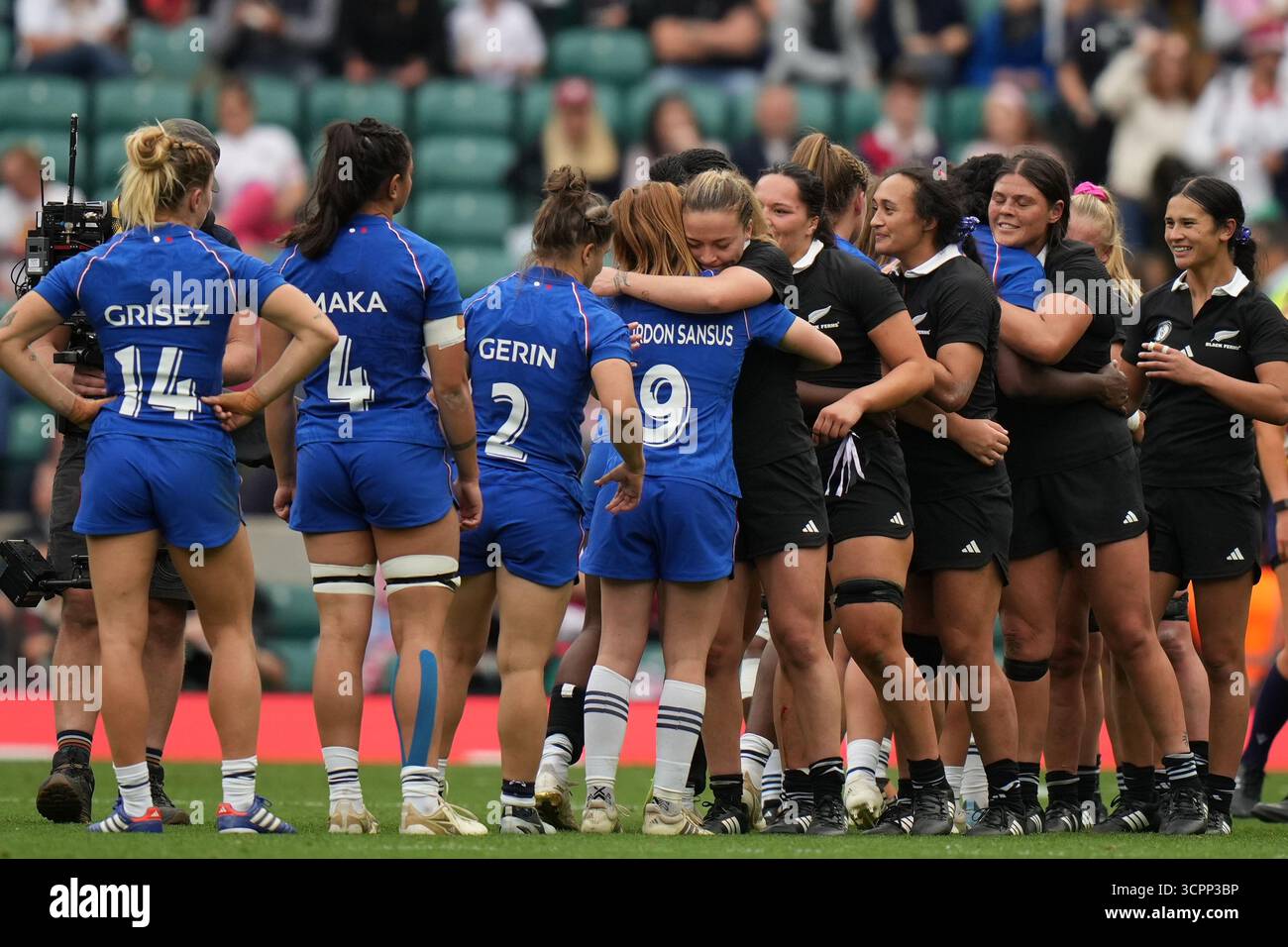 New Zealand's Renee Holmes, center, hugs Pauline Bourdon Sansus of ...